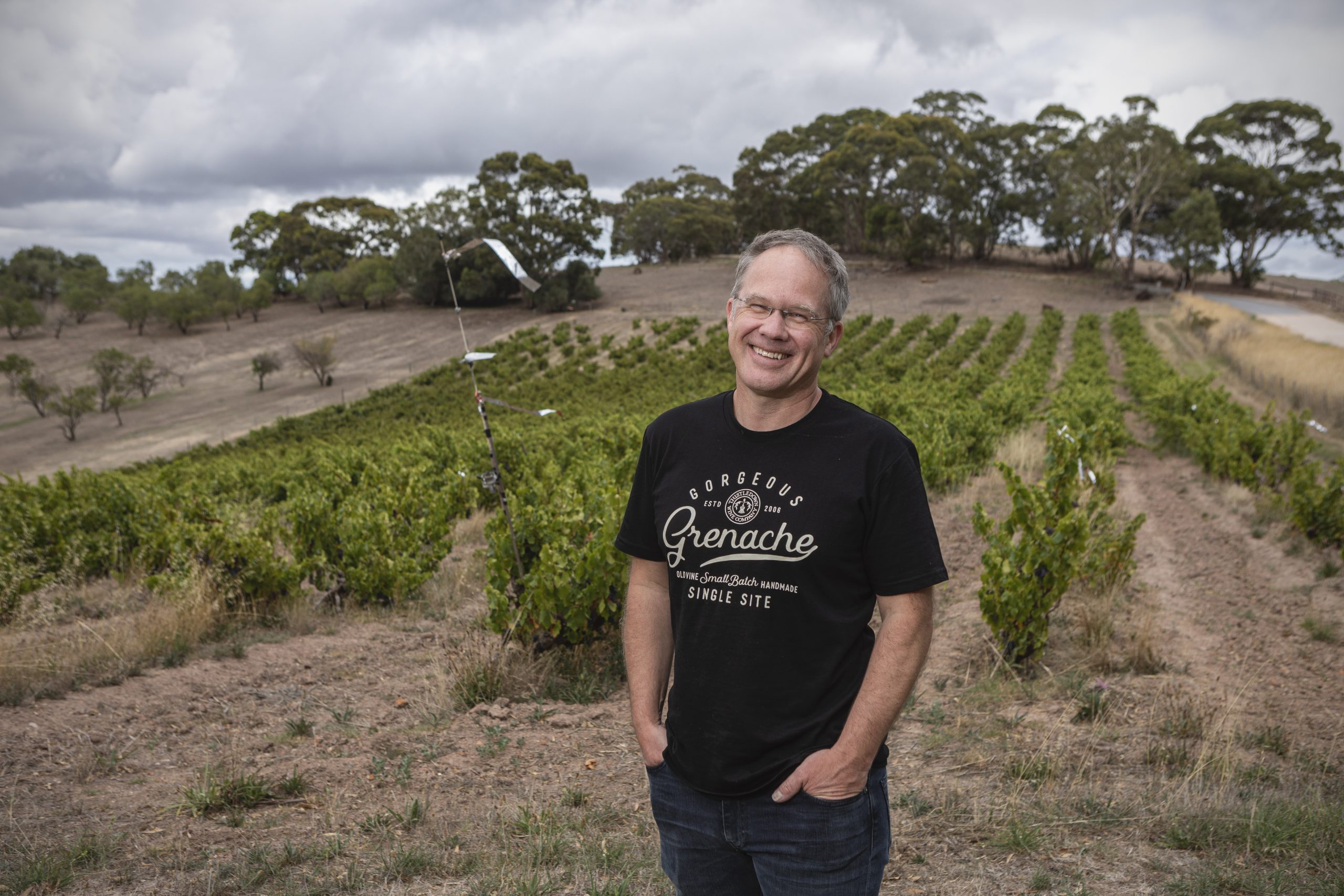 giles in vineyard smiling hero – The Real Review